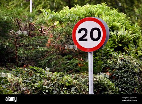 Road Sign Showing A 20 Mph Speed Limit At The Approach To A Residential