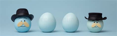 Easter Eggs With Funny Faces On Blue Background Happy Easter Concept