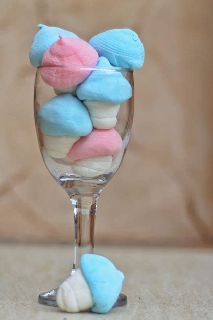 Premium Photo Close Up Of Multi Colored Glass On Table