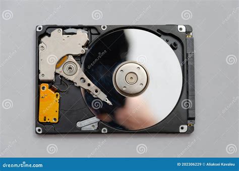 disassembled hard drive from the computer hdd with mirror effect