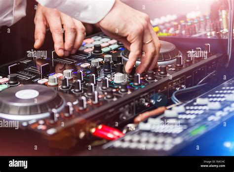 DJ Playing Music At Control Panel Stock Photo Alamy