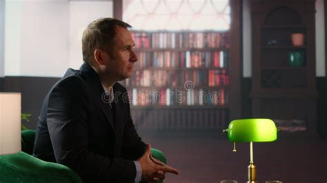 Elegant Classy Professional Enjoying A Bourbon During Meeting At A