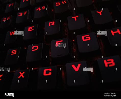 Backlit Keyboard Close Up Black Keys With Illuminated Characters