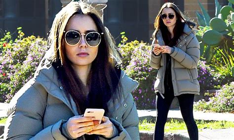 Lily Collins Models Oversized Sunglasses As She Heads To The Gym After