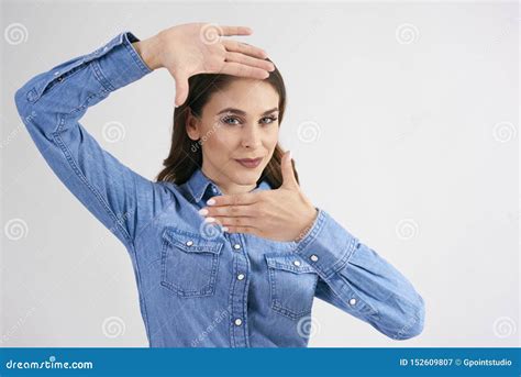 Young Woman Uses Her Fingers To Frame Her Face Stock Image Image Of