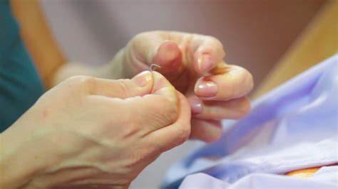 Tailor Sewing Button On Shirt Stock Footage Videohive