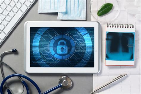 web security and technology concept with tablet pc on table stock image