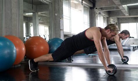 Premium Photo Man Working Out In Gym