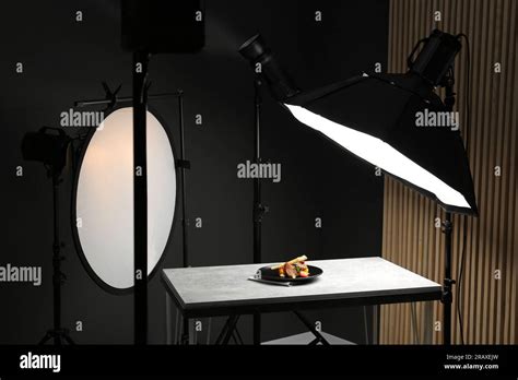 Composition With Baked Chicken Parsnip And Strawberries On Grey Table In Professional Photo