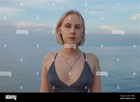 Portrait Of Beautiful Short Haired Blonde Woman Standing On The