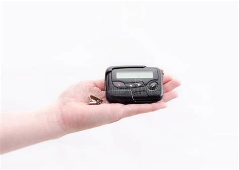 Pager In Close Up An Old Retro Communication Device In Female Hand On