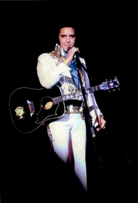 Elvis On Stage In The Indian Feather Jumpsuit In 1975 Elvis Elvis