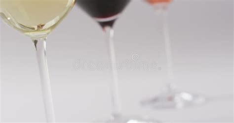Diverse Types Of Wines In Glasses On White Surface With Copy Space