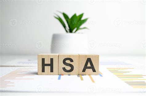 Hsa Health Savings Account Text Written On Wooden Blocks And Charts