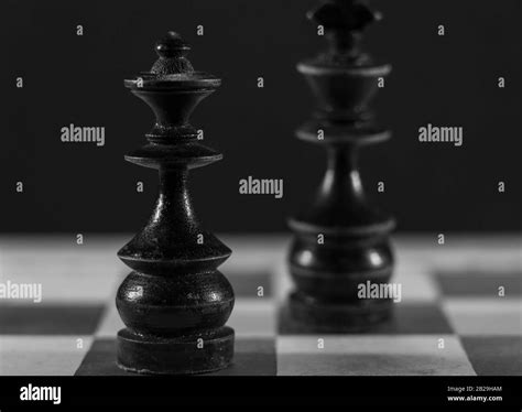 Image Of Chess Pieces On Board For Game Black And White Style Stock