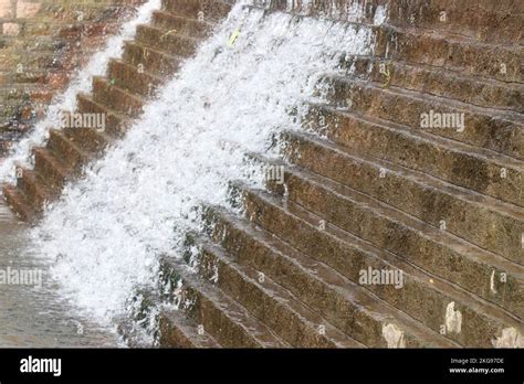 Water Is Flowing On Steps That Is Built On A Small Overflow Dam Used To