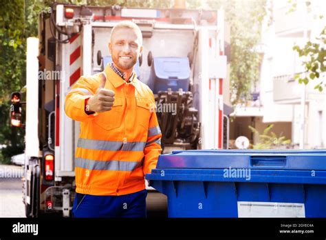 Garbage Removal Man Doing Trash And Rubbish Collection Stock Photo Alamy