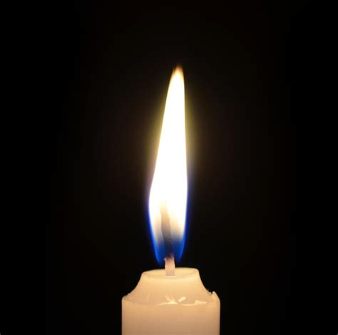 Premium Photo Burning Candles On Black Background