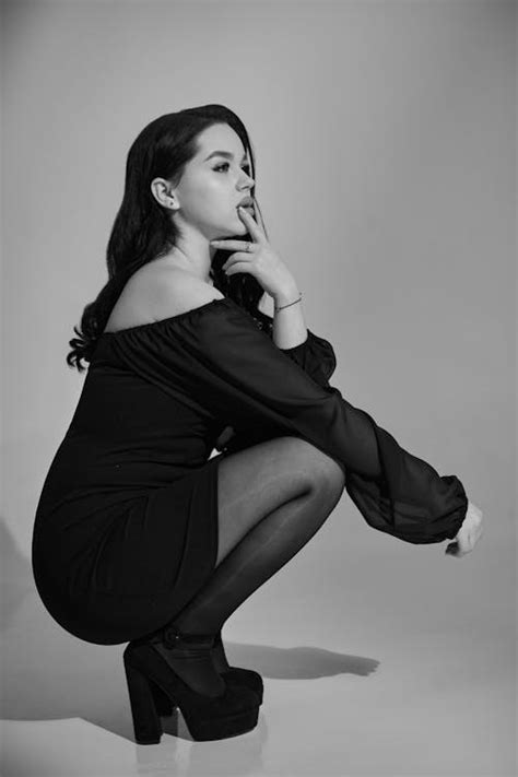Woman Squatting Dress Photos Download The Best Free Woman Squatting