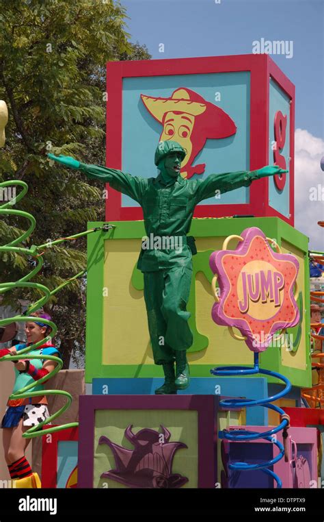 A Colourful Toy Story Float Parading On The Streets Of Walt Disneys