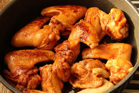 Kuřecí křidélka s tandoori cibulovým kuskusem fotografie TopRecepty cz