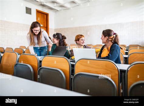 Young Friends Studying Inside University Classroom School Education