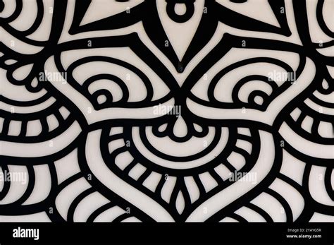 Delicate Swirls And Curves Intertwine In A Striking Black And White