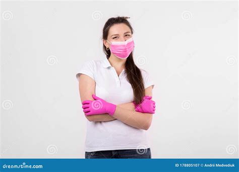 Beautiful Woman In Pink Medical Mask On A White Background Woman