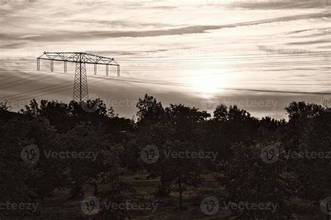 High Voltage Power Pole With Overhead Line Through Which The