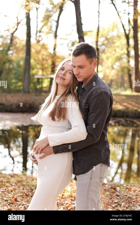 Family day. Stylish marriage pregnant couple waiting for baby. Man is ...