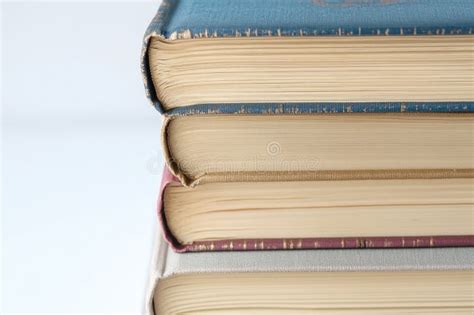 A Stack Of Books Stacked On Top Of Each Other Stock Image Image Of