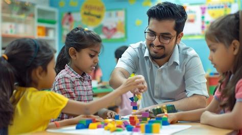 Premium Photo A Man And A Girl Playing With Blocks In A Classroom