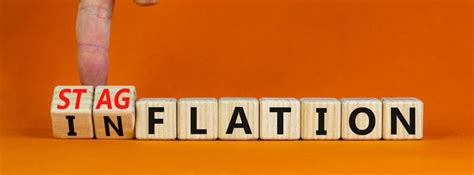 Stagflation Or Inflation Symbol Businessman Turns Cubes And Changes The Concept Word Inflation