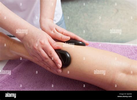 Beauty Treatment Woman Relaxing Getting Spa Hot Stone Therapy Legs