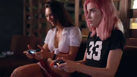 Two Girls Playing Tv Game Holding Joysticks Stock Footage Video Of