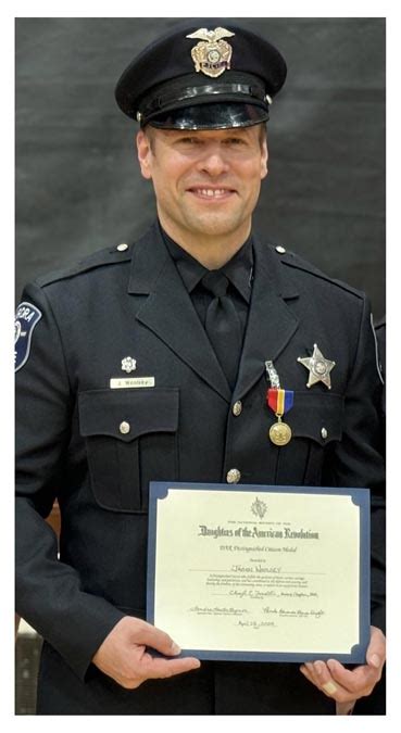 Officer Woolsey Receives Distinguished Award The Voice