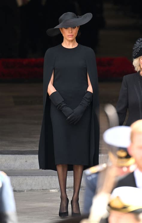 Meghan Markle Wears Beautiful Cape Dress To Queens Funeral