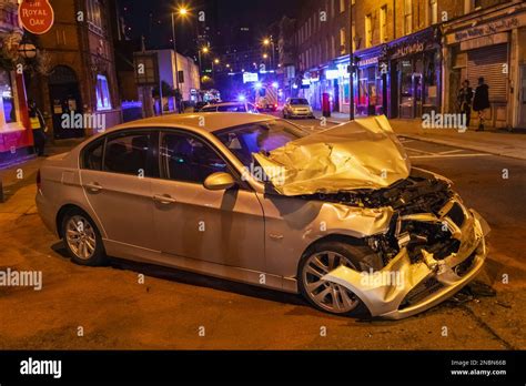 England London Smashed Car After Accident In Street At Night Stock