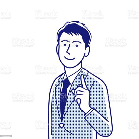 A Man In A Suit Who Raises His Index Finger And Explains One Point