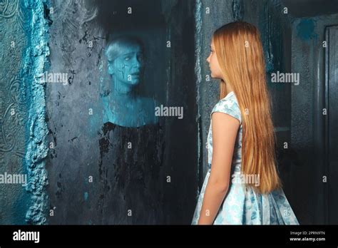 Lunatic Young Girl Looking In The Mirror And Seeing In Reflection A