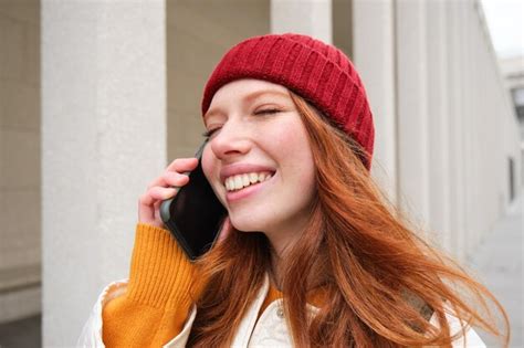 Premium Photo Mobile Broadband And People Smiling Young Redhead Woman