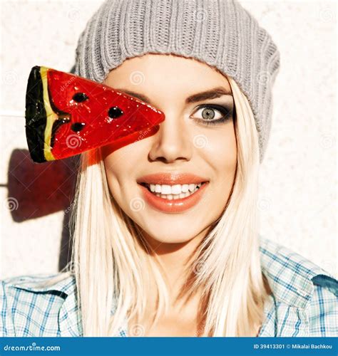 Beautiful Blonde Girl In Beanie Hat With Smokey Eye Make Up Who Stock