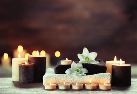 Premium Photo Spa Composition With Candles On Brown Background