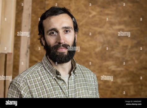 Horizontal Photo A Warm Portrait Of A Bearded Man In A Plaid Shirt
