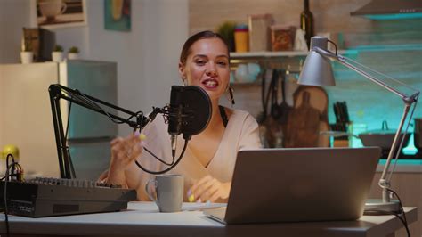 Famous Vlogger Waving At Camera From Home Studio Durinng Chat With