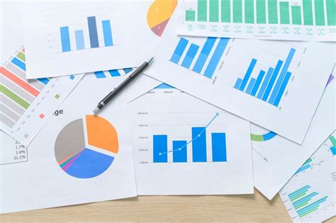 Premium Photo Top View Of Documents With Analytics Data Lying On Tableselective Focusx9