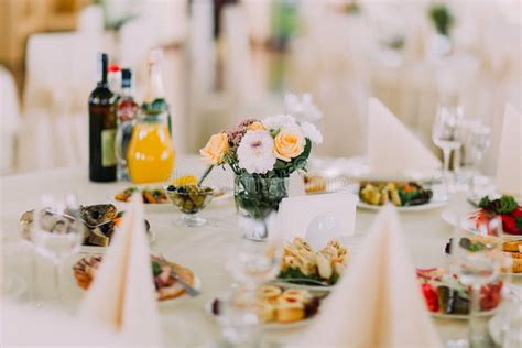 Finely Served Banquet Restaurant Table With Snacks Cutlery Wine