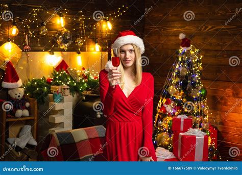 Christmas Girl In Red Dress With Champagne Christmas Preparation