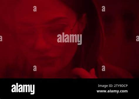 Silhouette Of Woman Shaking Hair On Red Background Sexy Girl