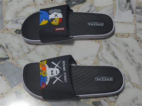 Slides Kaws Mens Fashion Footwear Flipflops And Slides On Carousell